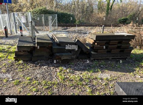 Unused Level Crossing Track Mouldings Stacked Next To A Level Crossing