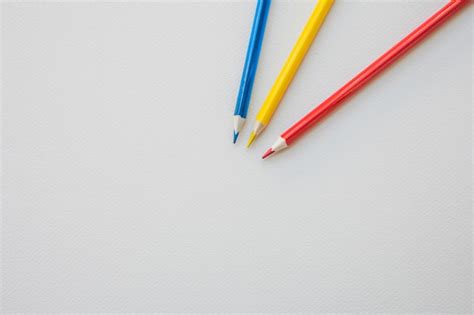Free Photo Colored Pencils Lying On Paper