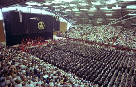 An Auditorium Full Of People With One Person Speaking