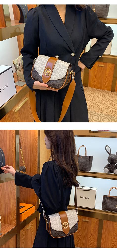 香港代购正品女包2023新款真皮单肩斜挎包女小众复古高级感马鞍包 阿里巴巴