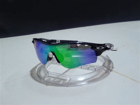 Yahooオークション 正規品 新品 偏光レンズ2枚付き Oakley Radarloc
