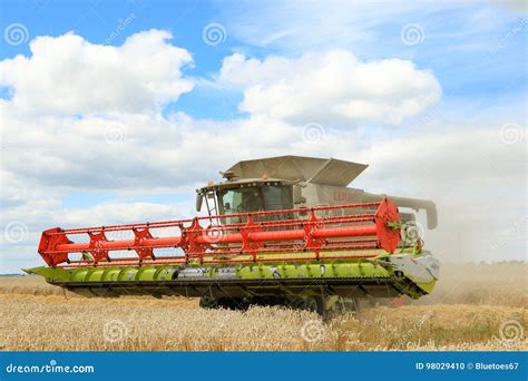 Modern Class Combine Harvester With Header In The Air Editorial Image