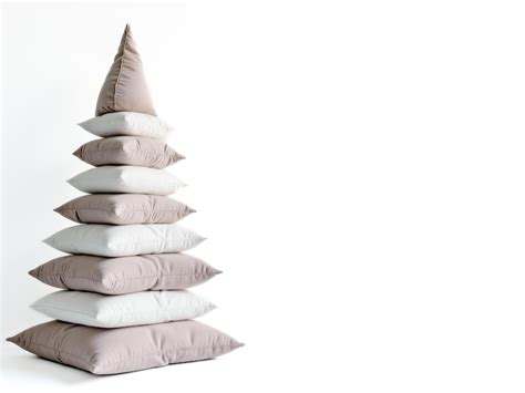 Soft Pillow Stack In The Shape Of A Tree Premium Ai Generated Image