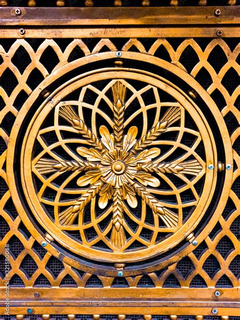 Abstract Floral Ornament Consisting Of A Grid And Gilded Wheat Ears