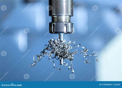 A Close Up View On Collet Chuck And Swarf Wrapped Over Carbide Drill