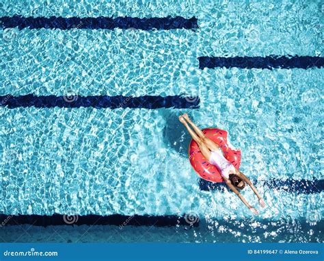 Woman Relaxing With Lilo In Pool Stock Image Image Of Adult Resort 84199647