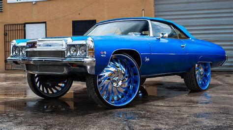 Chevy Donk Squatting Hard On 32s Big Rims Custom Wheels