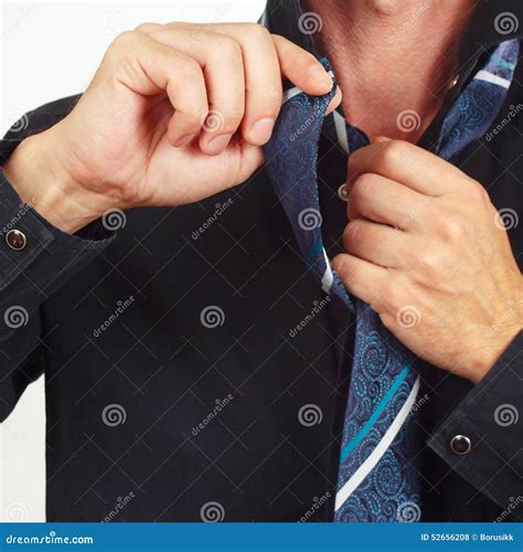 Man Unleashes His Tie Over Black Shirt Closeup Stock Photo Image Of