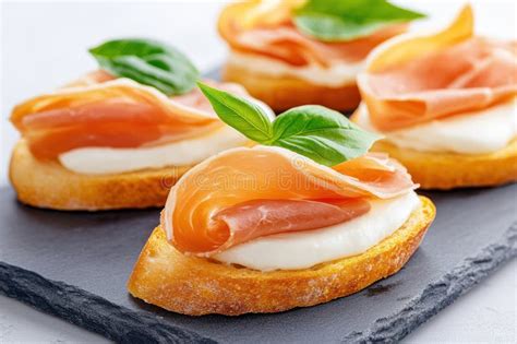 Prosciutto And Mozzarella Bruschetta Bites Stock Illustration