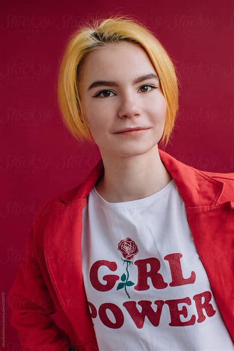 Pretty Girl With Yellow Hair And T Shirt With Girl Power Text Del