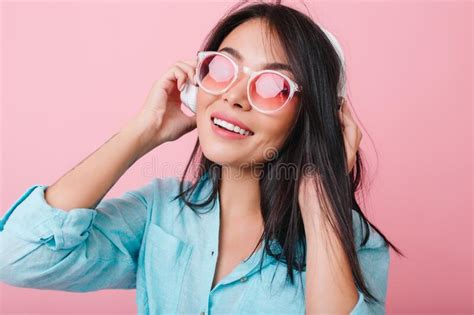Close Up Portrait Of Lovable Hispanic Woman In Sparkle Sunglasses