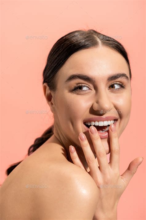 Excited Woman With Opened Mouth And Bare Shoulders Looking Away