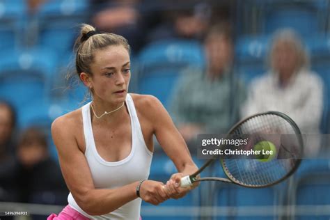 Isabelle Lacy Of Great Britain In Action Against Madison Brengle Of