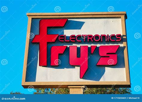 Fry`s Electronics Sign Near Brick And Mortar Big Box Store And Retailer