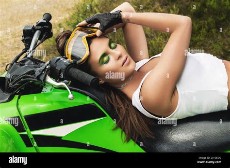 Stylish And Beautiful Woman And The ATV Stock Photo Alamy