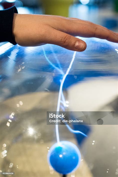 Electric Sphere Produce Plasma With Blue Sparks And Bolt Science