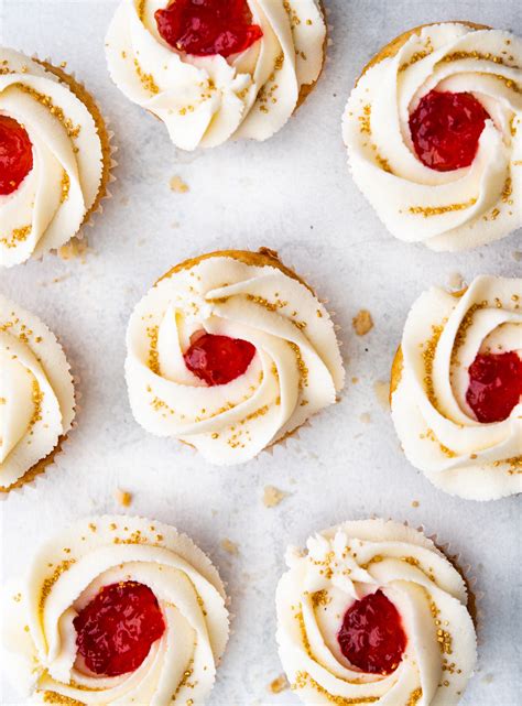 Fuffy Jam Filled Cupcakes With Buttercream Frosting Out Of This World