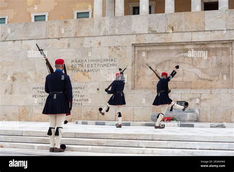 Text On The Wall And One Bed Remains Empty For The Unknown In Greek And