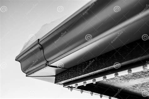 Underside Of A Roof Gutter With Permanent Holiday Led Lighting Being
