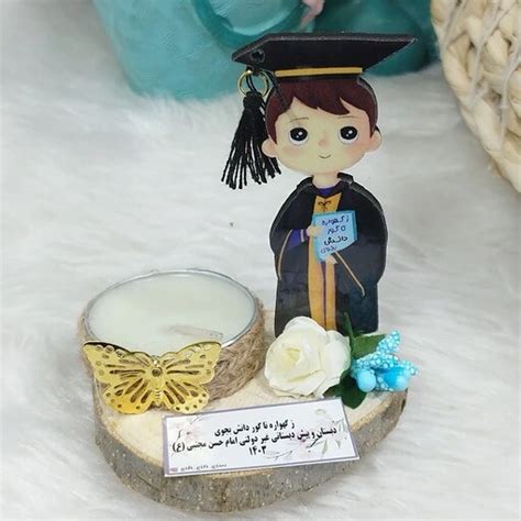 خرید و قیمت گیفت فارغ التحصیلی دانا با چوب و پروانه طلایی و گل کرمی ترب