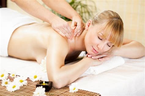 Premium Photo Young Beautiful Woman Receiving Back Massage At The Spa