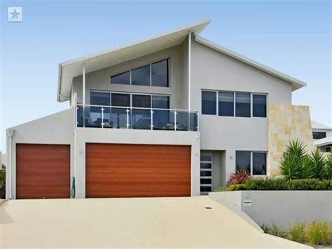 Modern Concrete House With Two Garages
