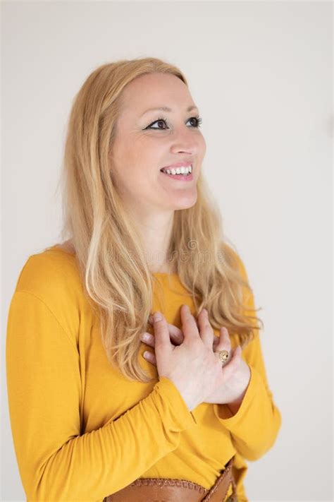 Portrait Of Cheerful Confident Beautiful Woman With Long Blond Hair Wearing Casual Clothes