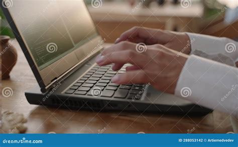 Female Dev Typing On Laptop Keyboard In Tropical Cafe Software Developer Writes Program Code On