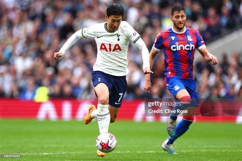 Son Heung Min Of Tottenham Hotspur Runs With The Ball Whilst Under