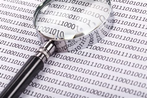 Premium Photo Magnifying Glass And Document With Figures