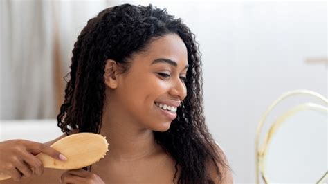 A Detangling Brush Is A Curly Girls Best Friend Heres How To Use It