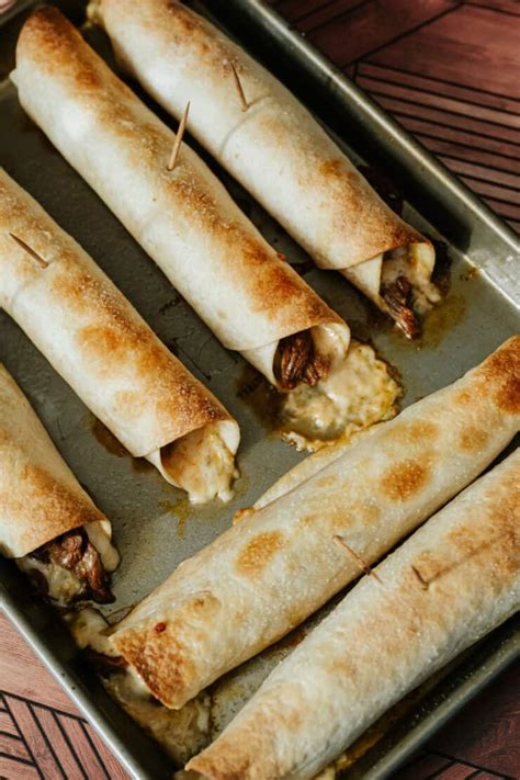 Baked Beef Flautas With Birria Muy Bueno