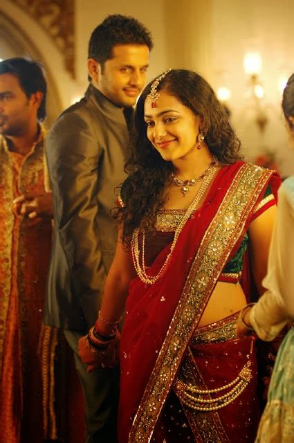 Nithya Menon Hot Navel Show Stills Hot Blog Photos
