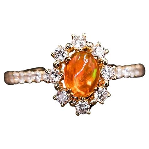 Minimalist Fire Opal Marquise Shaped Halo Diamond Engagement Ring For