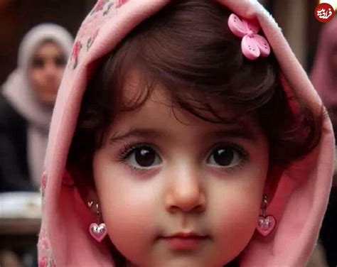 تصویری تلخ از سنگ قبر دختر کاپشن صورتی حادثه کرمان عکس