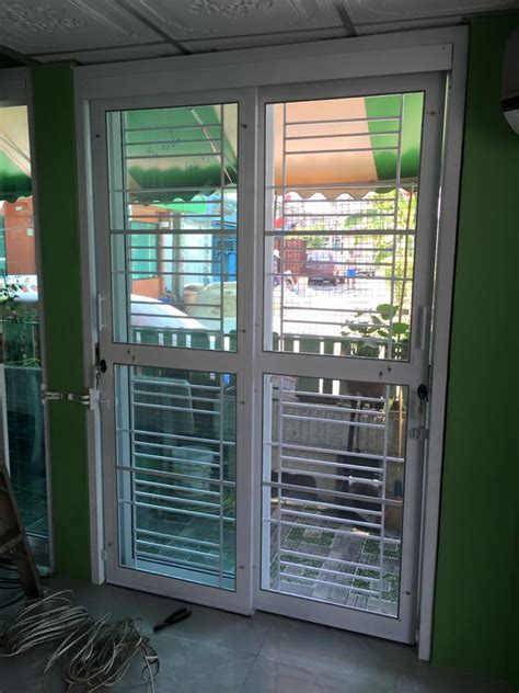 ประตูเหล็กด ก รุ่งโรจน์ มุ้งลวดเหล็กดัดราคาถูก Happy Home