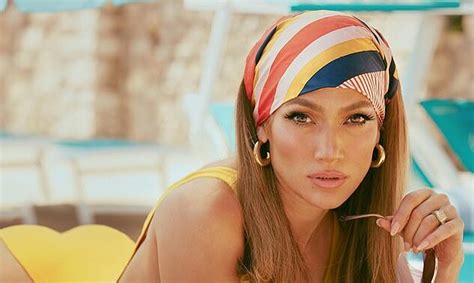 Ageless Beauty Jennifer Lopez Dials Up The Heat In A Revealing Yellow
