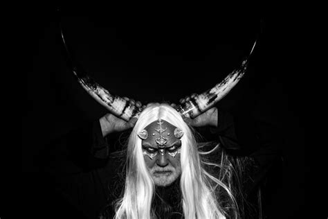 Premium Photo Demon Head Isolated On Black Man With A Bull Head