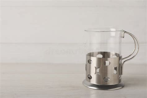 Traditional Tea Glass Holder On Wooden Table Space For Text Stock