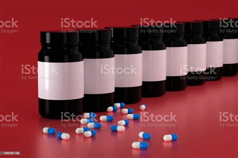 알려지지 않은 약물이있는 여러 용기 흩어져있는 알약은 거짓말을합니다 알약 비타민 개념 빨간색 배경3d 이미지 0명에 대한 스톡