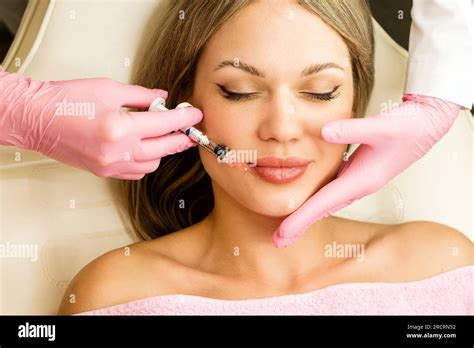 Lip Augmentation Procedure In Beauty Clinic Adjustment Shape And