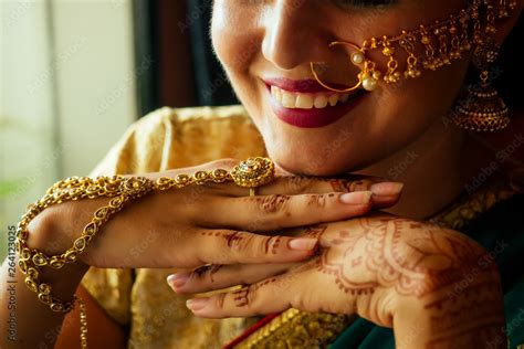 Portrait Indian Beautiful Female In Golden Rich Jewelery And Tradition
