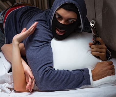 Burglar Breaking Into House At Night To Bedroom With Sleeping Woman Burglar Breaking Into House