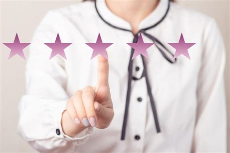 Premium Photo Woman Leaves A Review On The Seller S Website Shares Her Opinion And Puts A Star