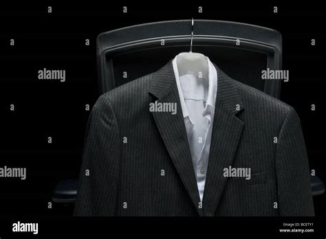 Suit Coat Hanging On Chair High Resolution Stock Photography And Images Alamy