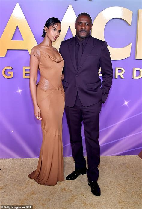 Idris Elba Looks Suave In Suit And Tie Alongside Model Wife Sabrina