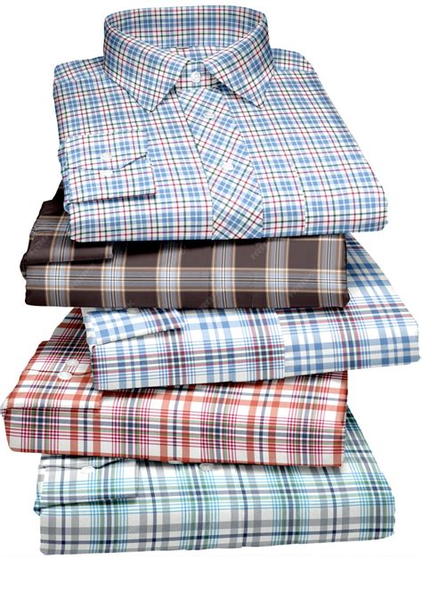 Premium Photo A Stack Of Plaid Shirts With A Shirt On The Front
