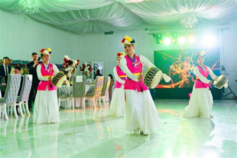 Dancers In National Costumes Dance A Traditional Korean Dance With