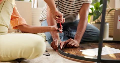 Couple Assemble Table And Move In To New Home For Renovations