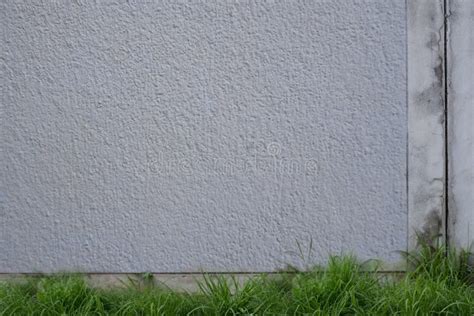 The Cement Walls Have A Bit Of Grass For The Background Stock Image